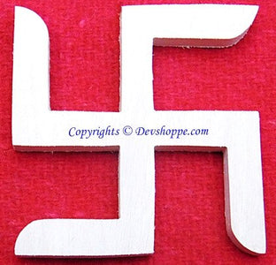 Auspicious Swastik (Sathiya) symbol carved out of Shriparni sacred woo ...